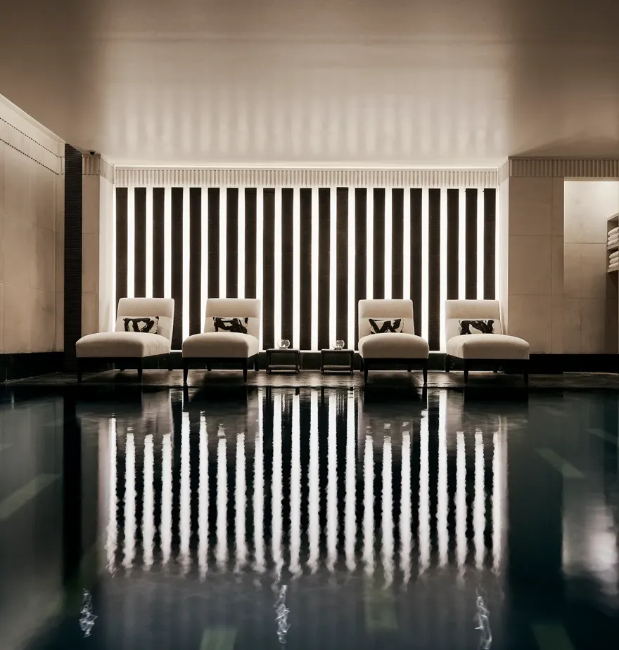 Indoor swimming pool with a sleek, contemporary design featuring a row ...